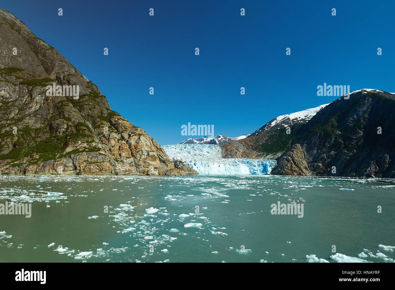 Glacier melting ice in alaska sea green water Stock Photo - Alamy
