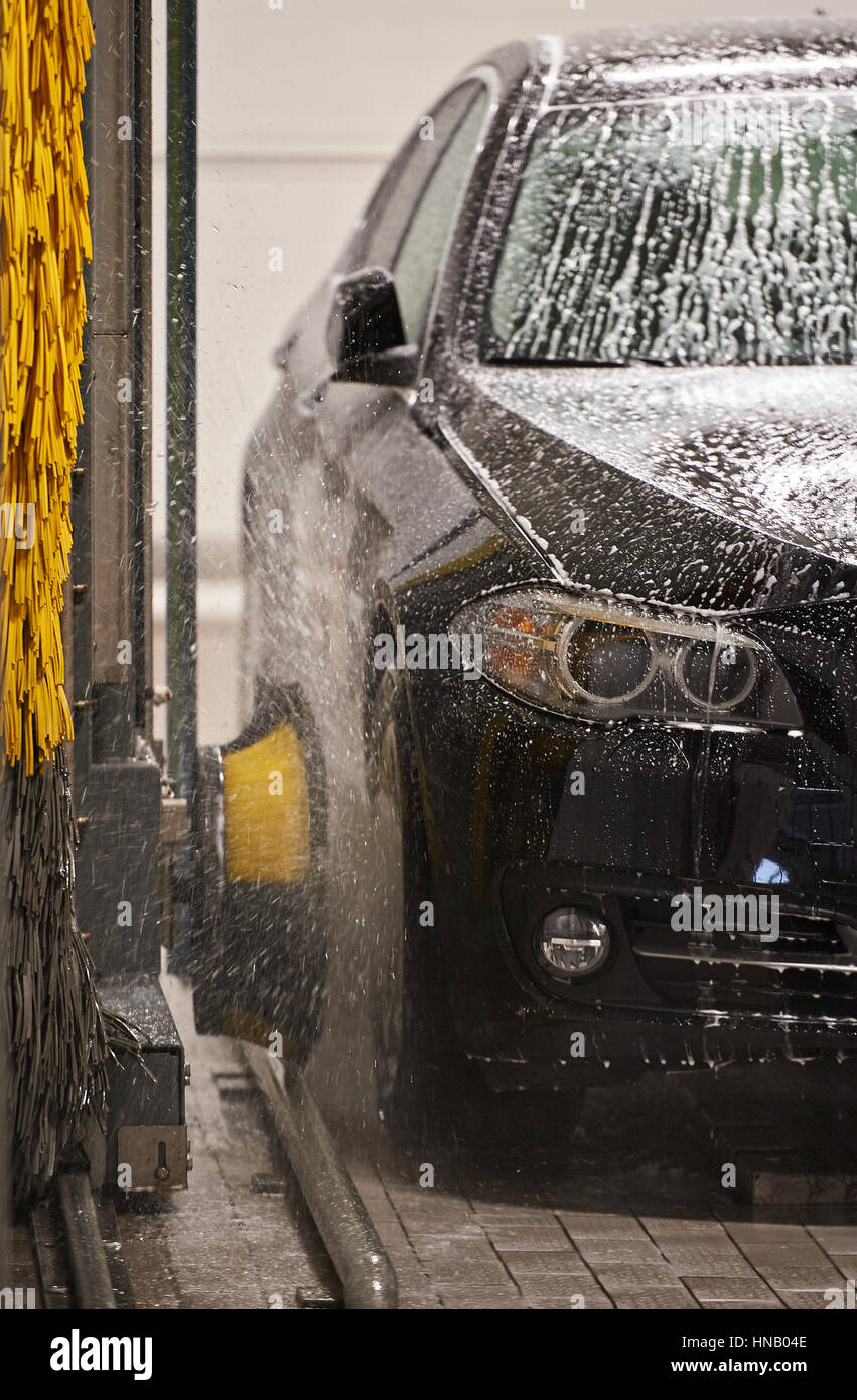 automatic wash vehicle washing wheel with brush Stock Photo - Alamy