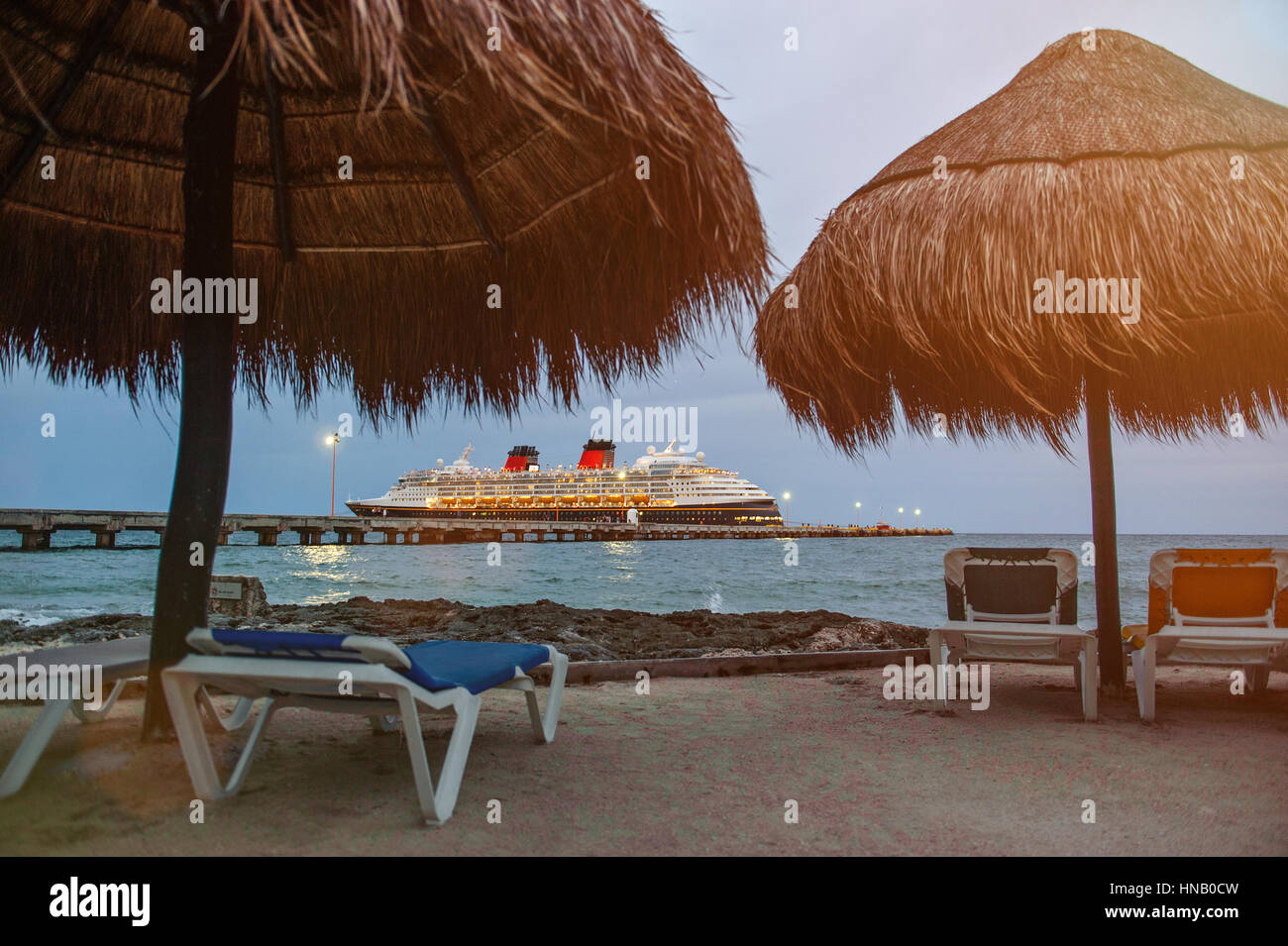 cruise ship docked in resort caribbean pier Stock Photo - Alamy