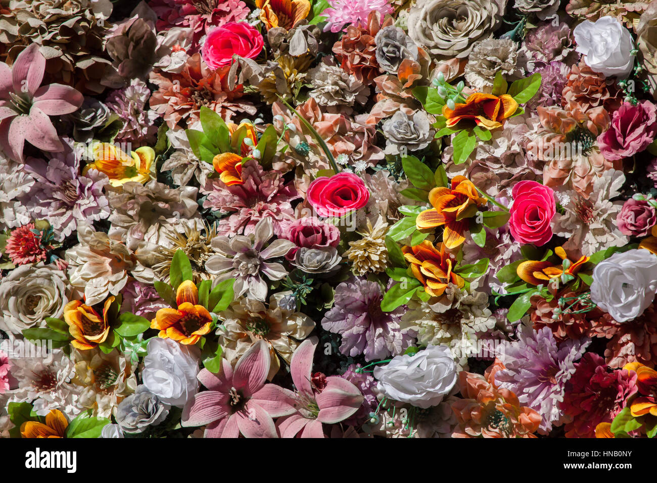 Artificial colourful flowers hi-res stock photography and images - Alamy