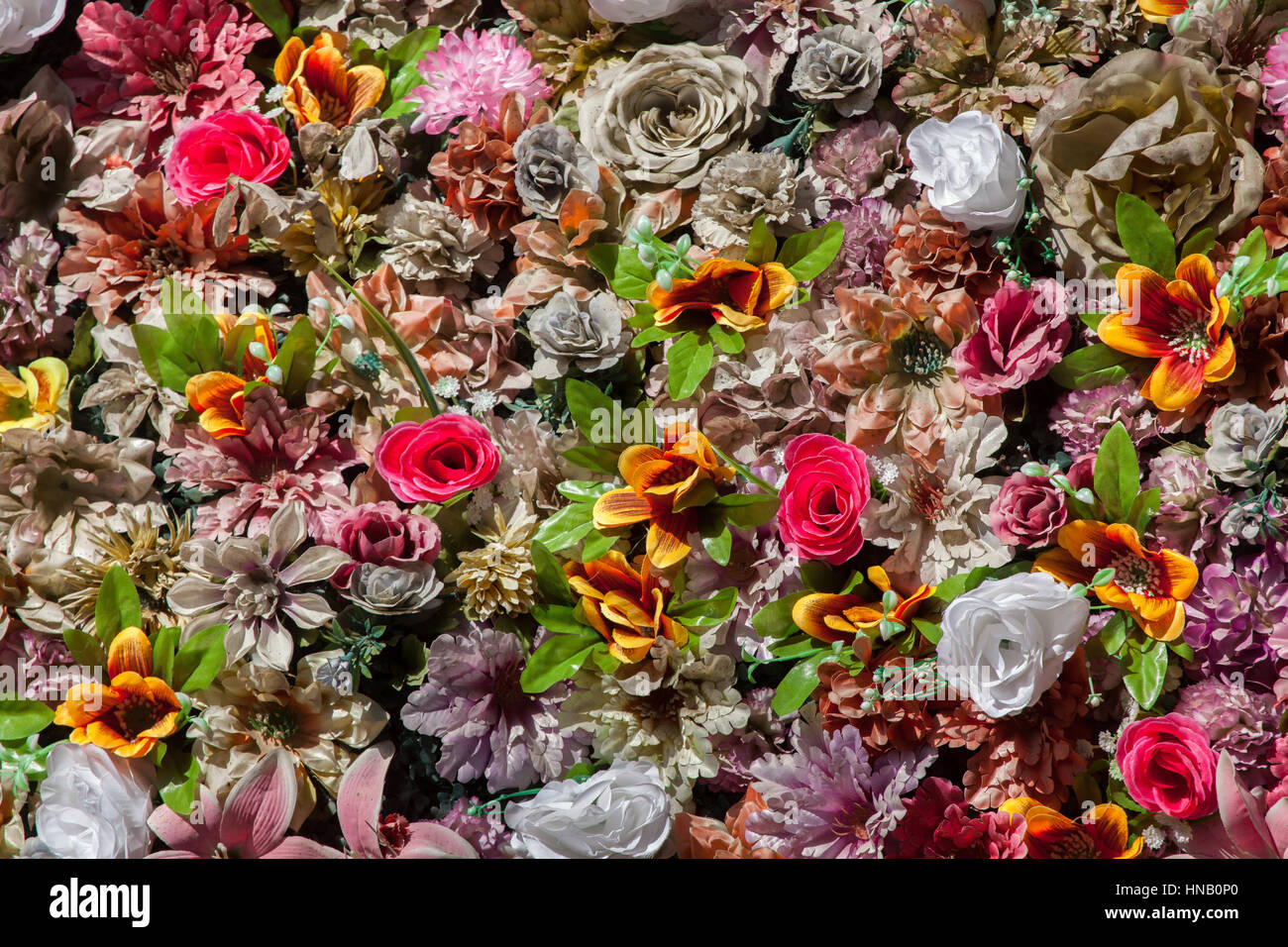 Red Plastic Flowers High Resolution Stock Photography and Images - Alamy