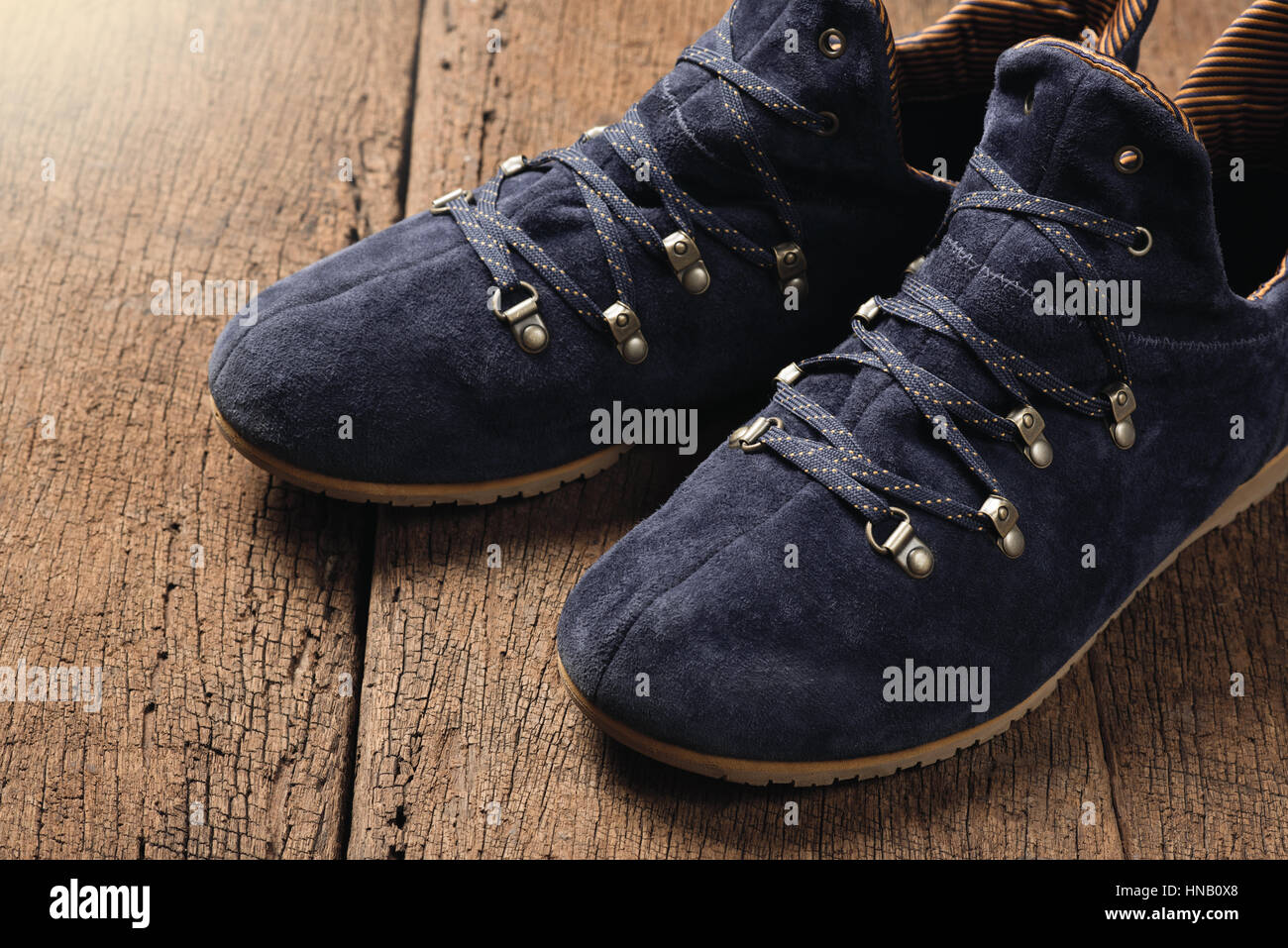blue suede shoes on wooden plank Stock Photo - Alamy
