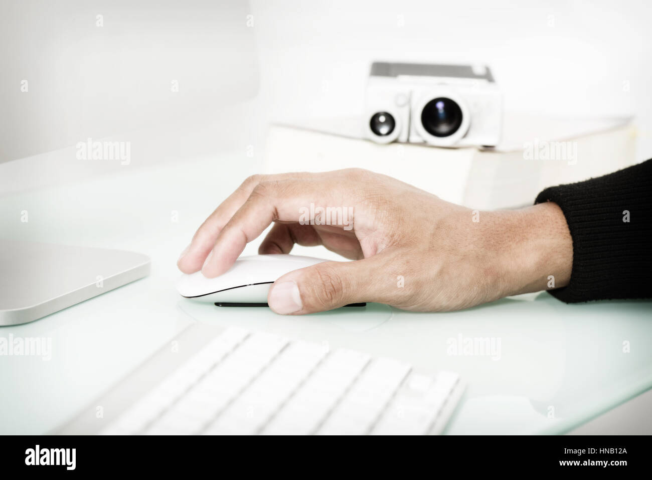 closeup man's hand on computer mouse Stock Photo - Alamy
