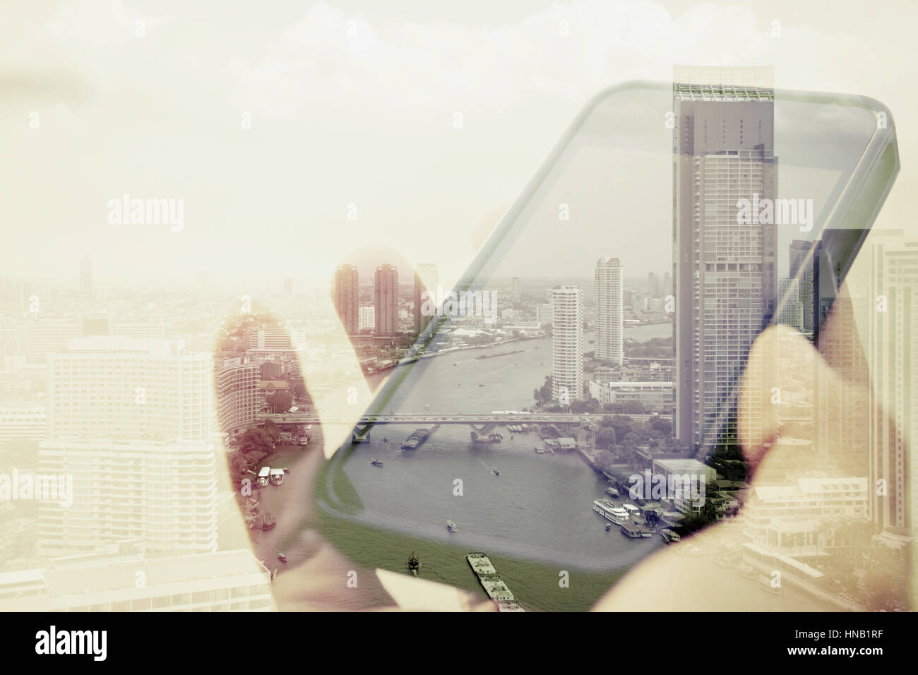 Double exposure image of people with smart phone and cityscape ...
