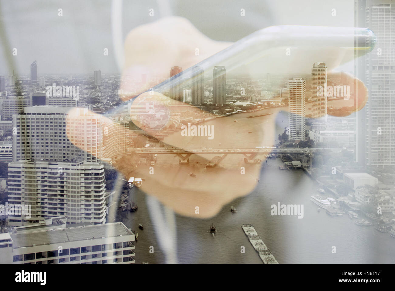 Double exposure image of people with smart phone and cityscape ...