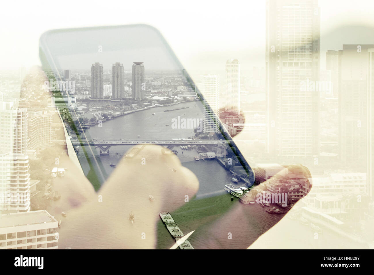 Double exposure image of people with smart phone and cityscape ...