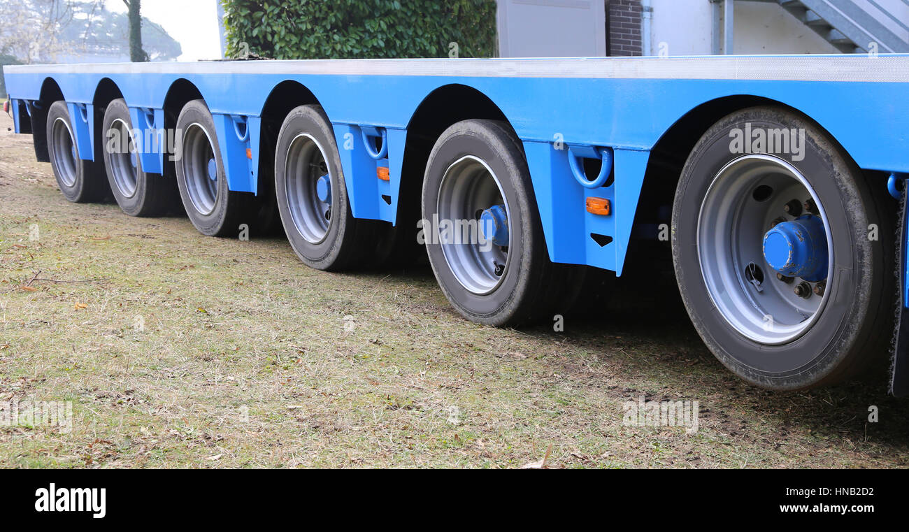 very long truck trailer for exceptional transport with many sturdy ...