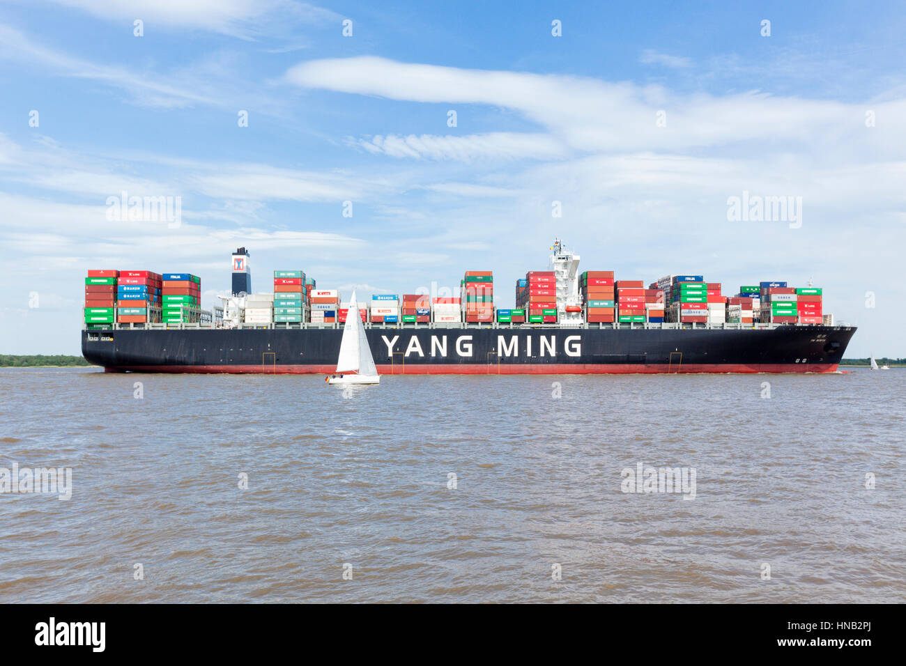 Stade, Germany - May 22, 2016: Ultra Large Container Ship YM Worth on the Elbe river near ...