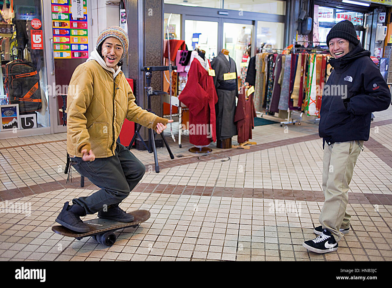 Friends in Tanukikoji shopping arcade,Sapporo, Hokkaido, Japan Stock ...