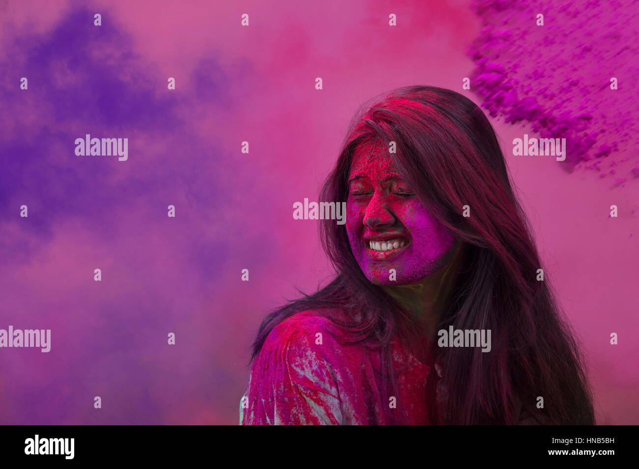 A Young Indian girl celebrating Holi festival Stock Photo - Alamy