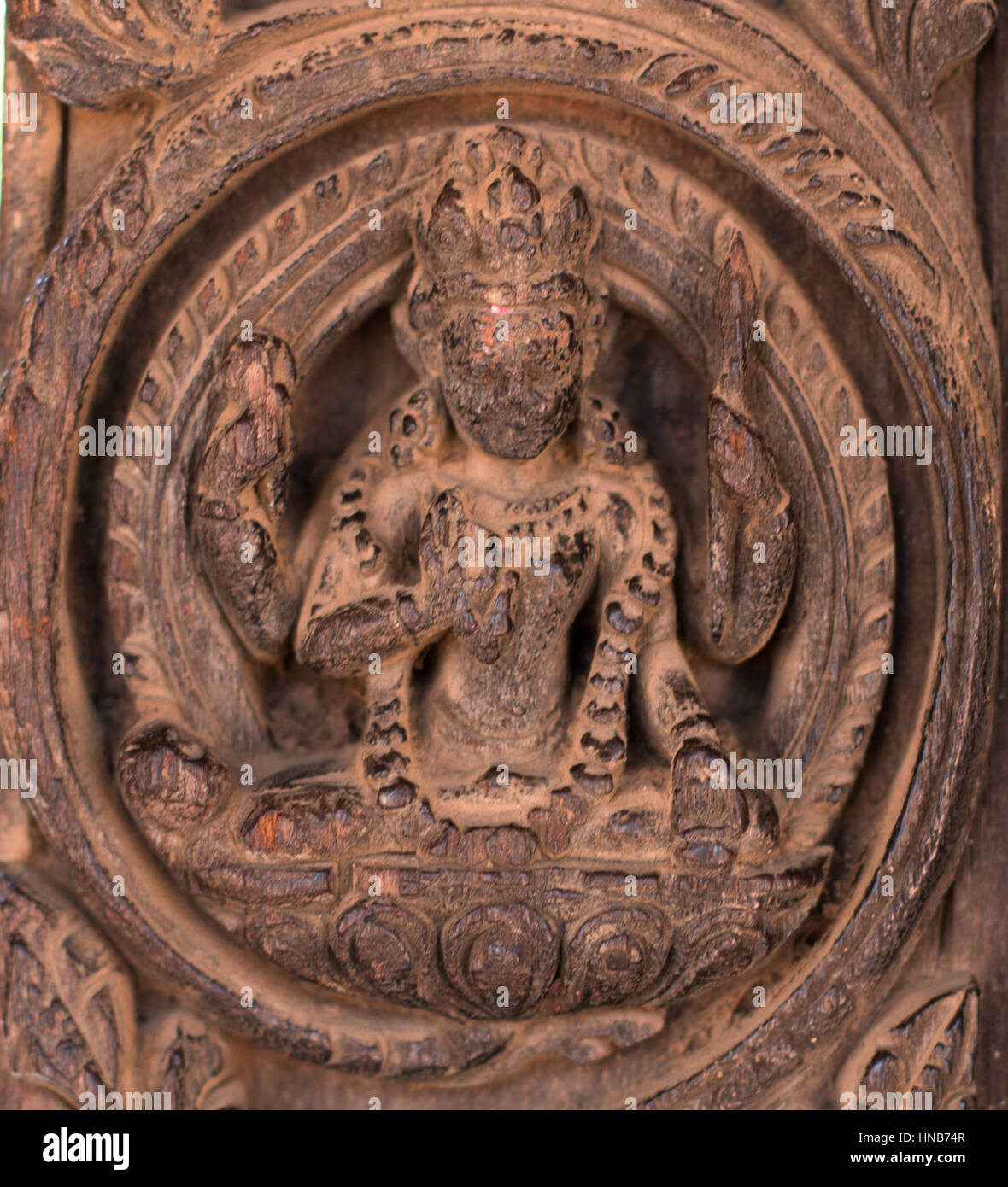 Wood carving of Hindu deities and heavenly nymphs adorn the walls of a ...