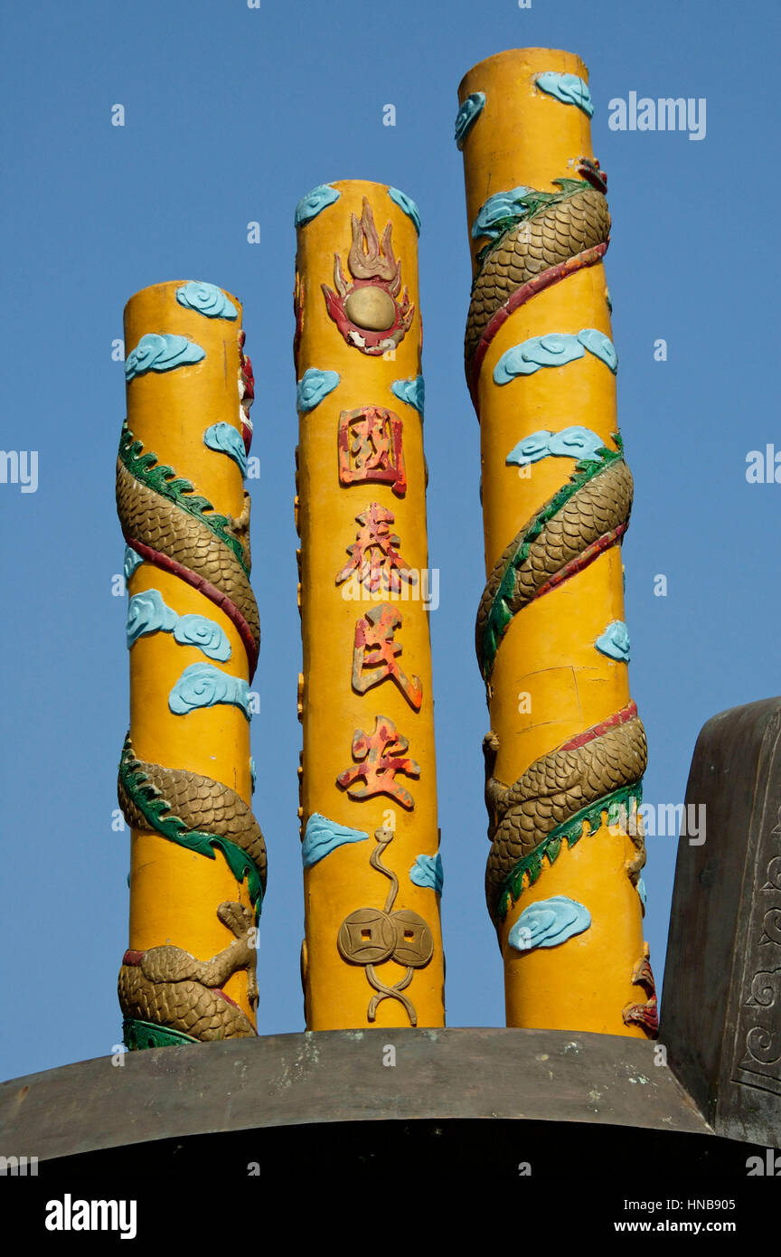 yellow big incense reaching the blue sky Stock Photo - Alamy