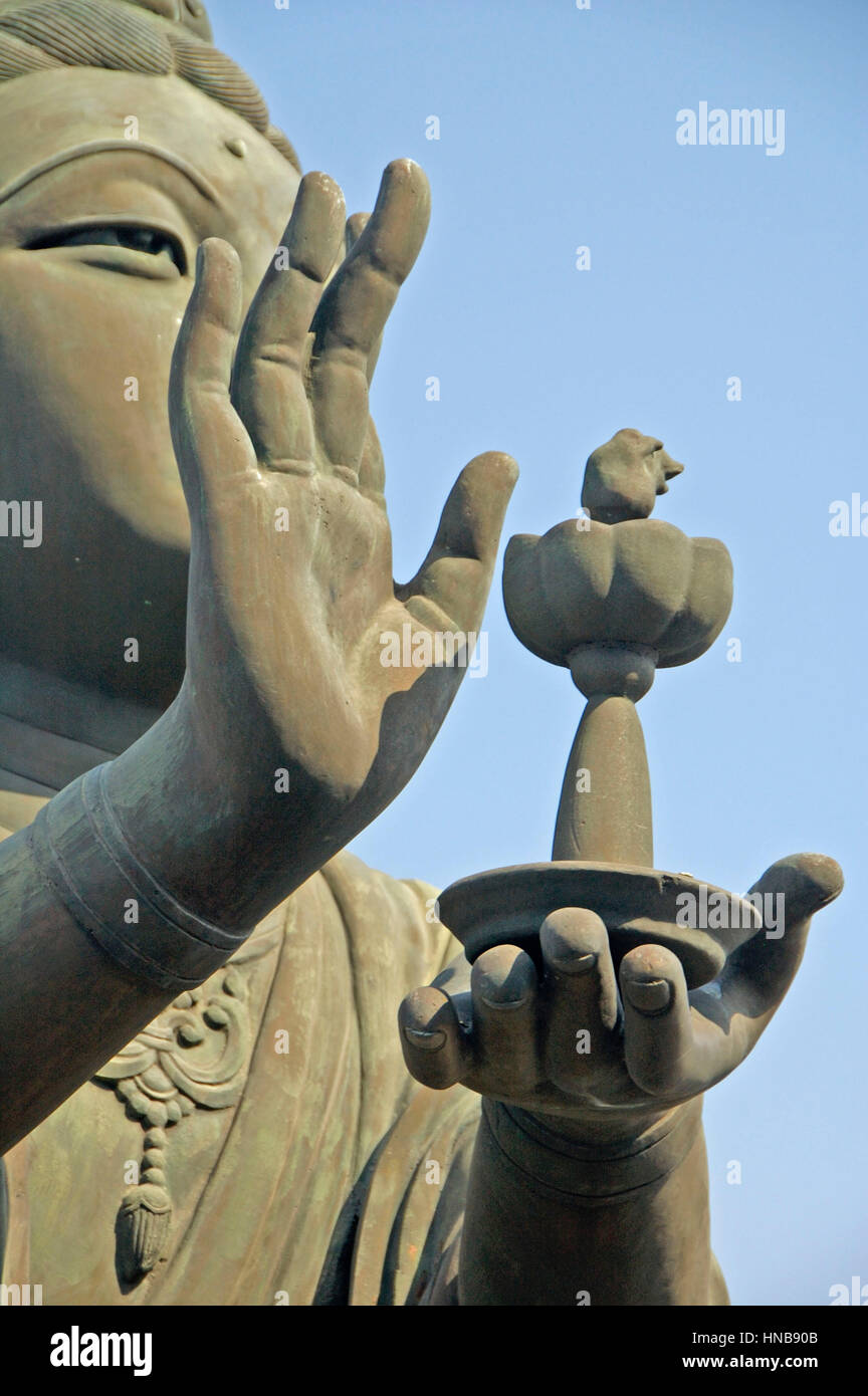 goddess offering lotus flower and gifts to Buddha Stock Photo - Alamy