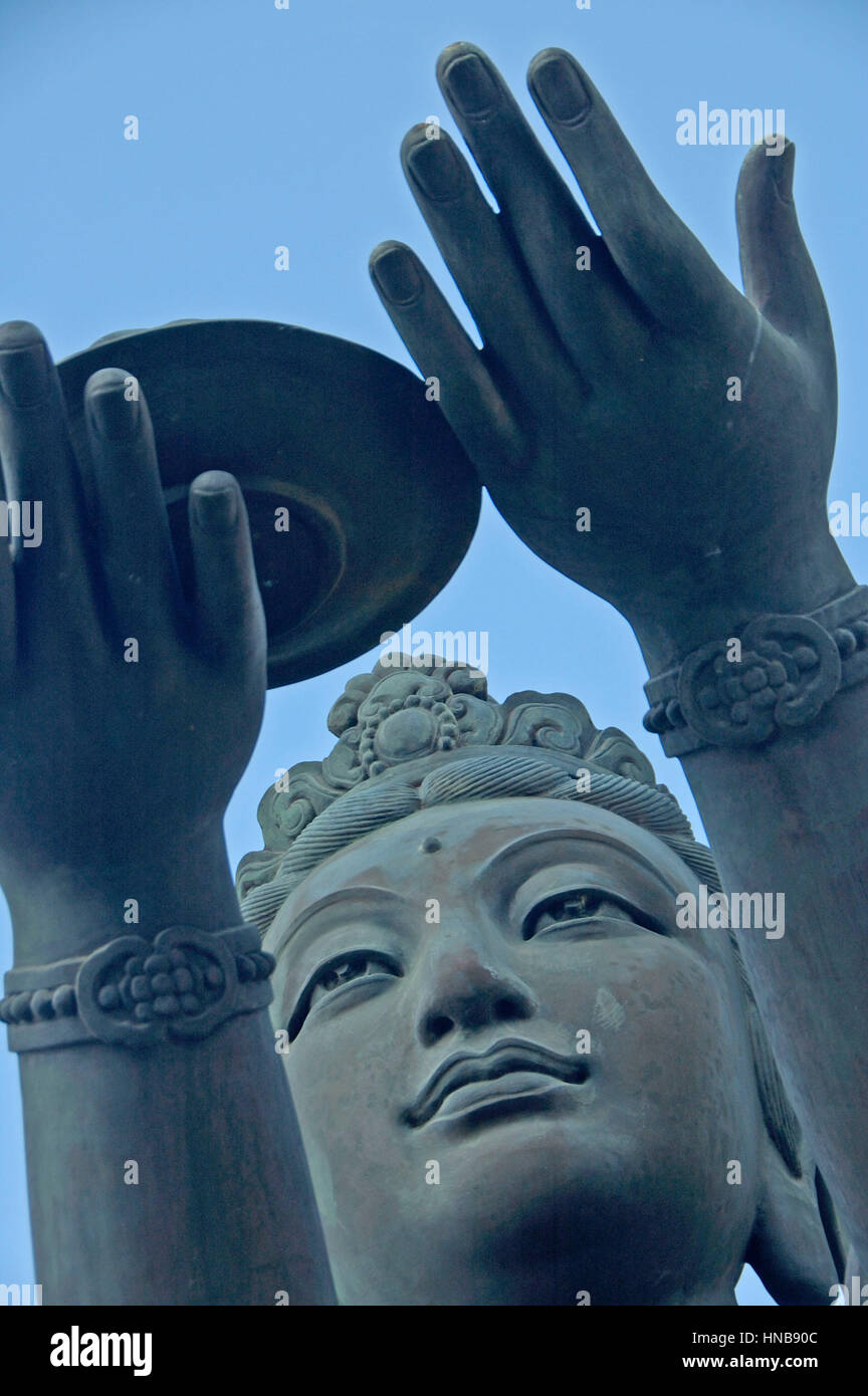 goddess offering lotus flower and gifts to Buddha Stock Photo - Alamy