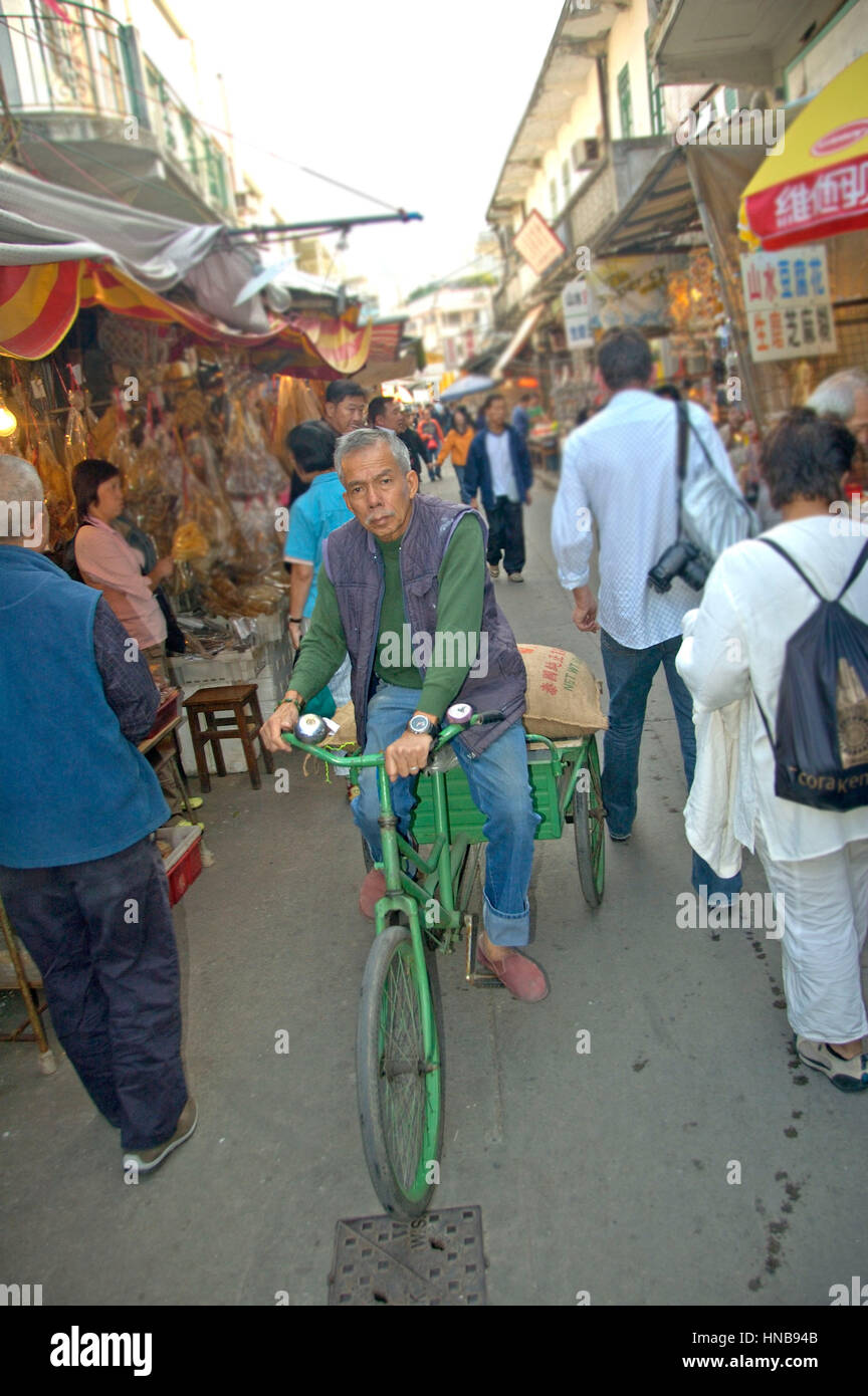 Hongkong, China, 04 December 2006: Biking at Food and fish market at ...
