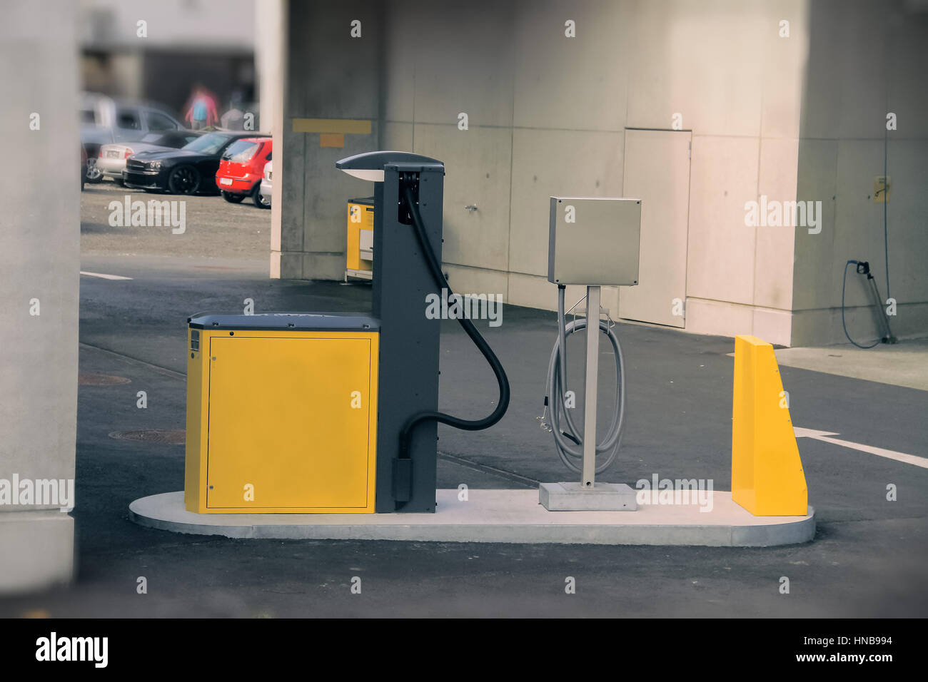 Yellow and black gas station close up Stock Photo - Alamy