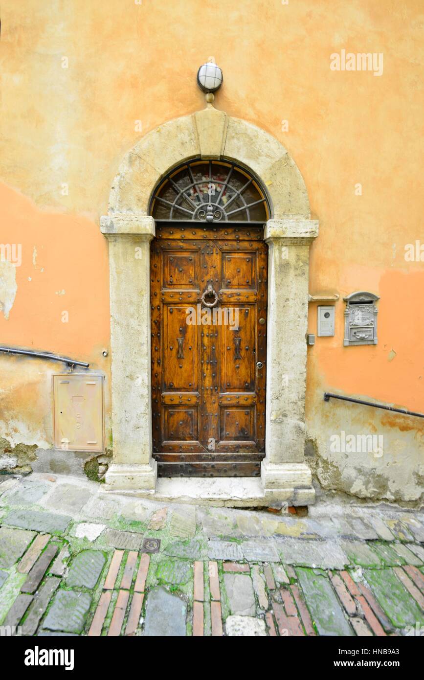 Beautiful door in a street at Perugia Italy Stock Photo - Alamy