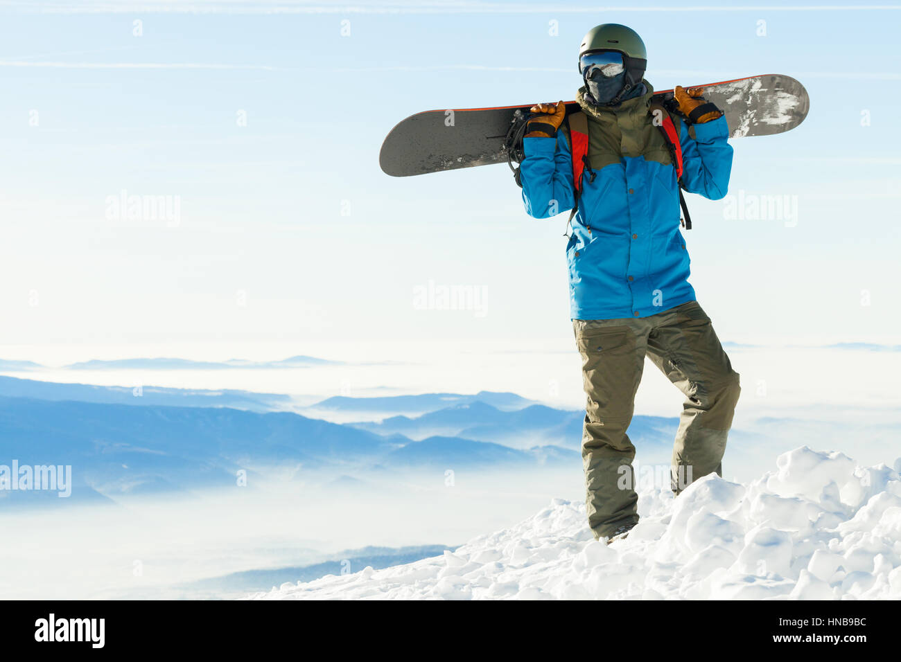 Back view young snowboarder hi-res stock photography and images - Alamy