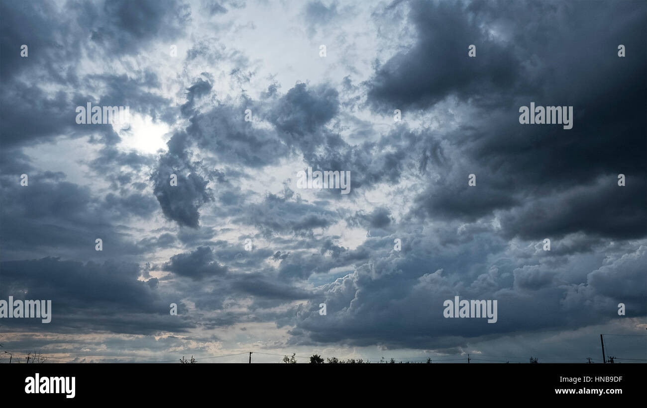 Very beautiful dark clouds slowly flying in the sky Stock Photo - Alamy