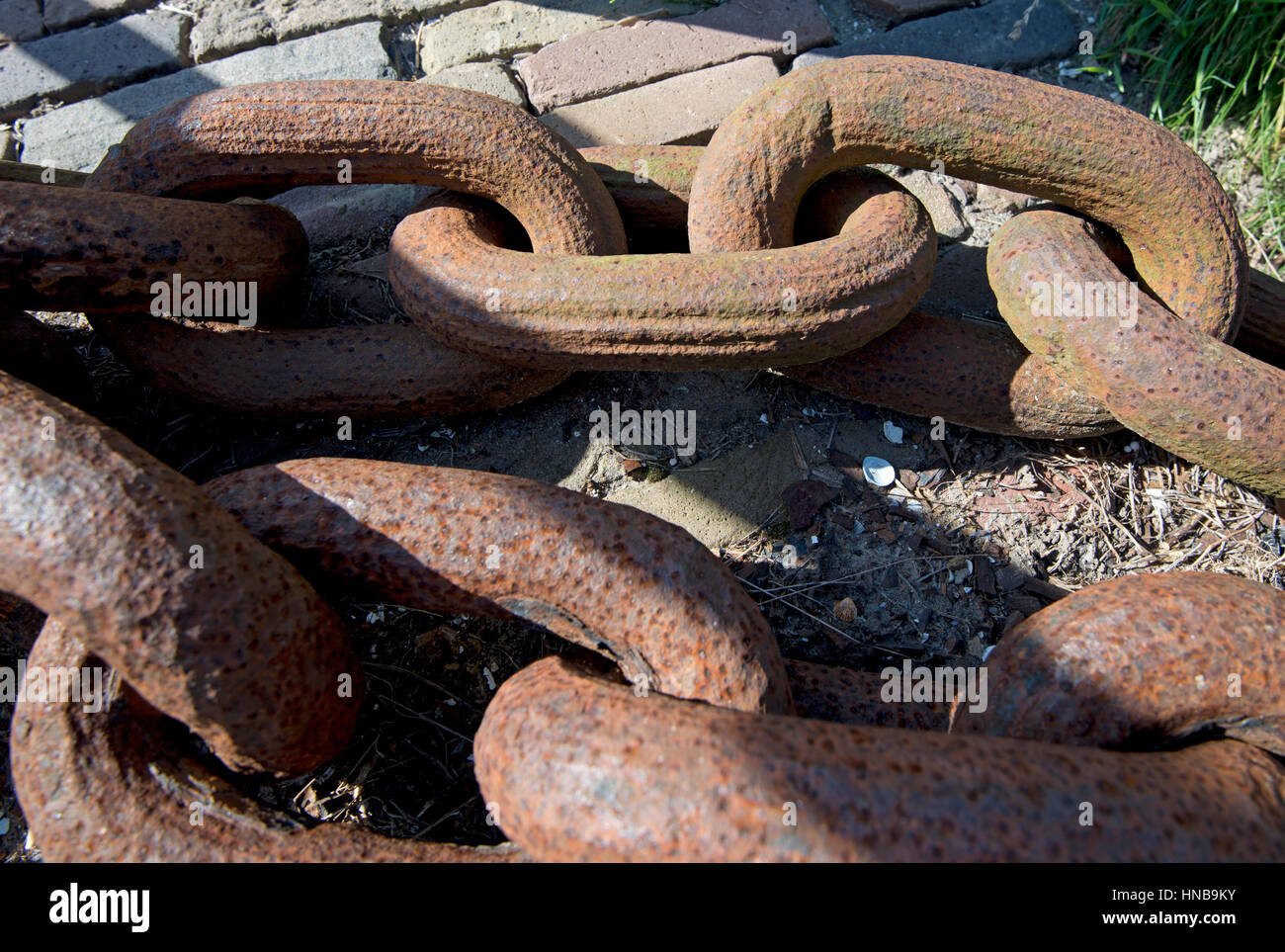 Rusty iron chain to make a connection Stock Photo - Alamy