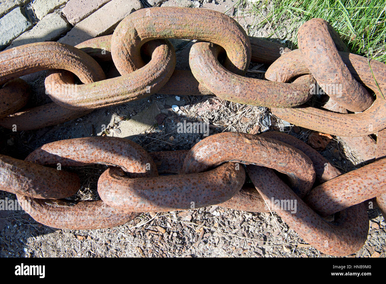 Rusty iron chain to make a connection Stock Photo - Alamy