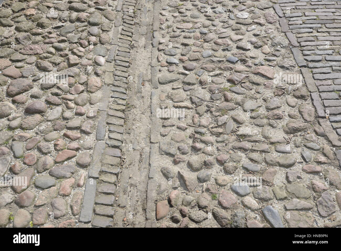 Pebbled street hi-res stock photography and images - Alamy