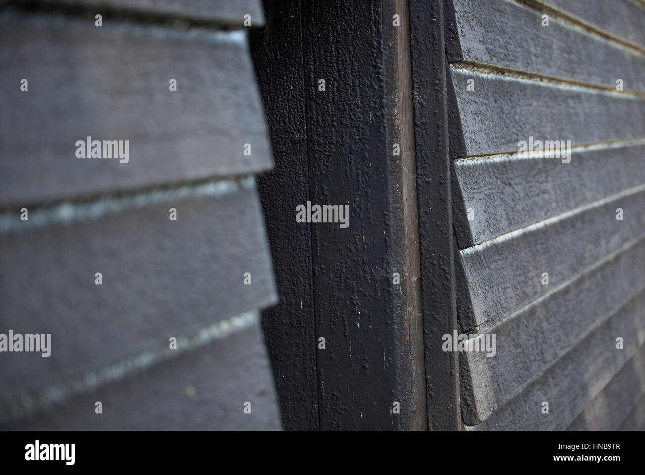black tar wooden shelf wall of a house in The Netherlands Stock Photo ...