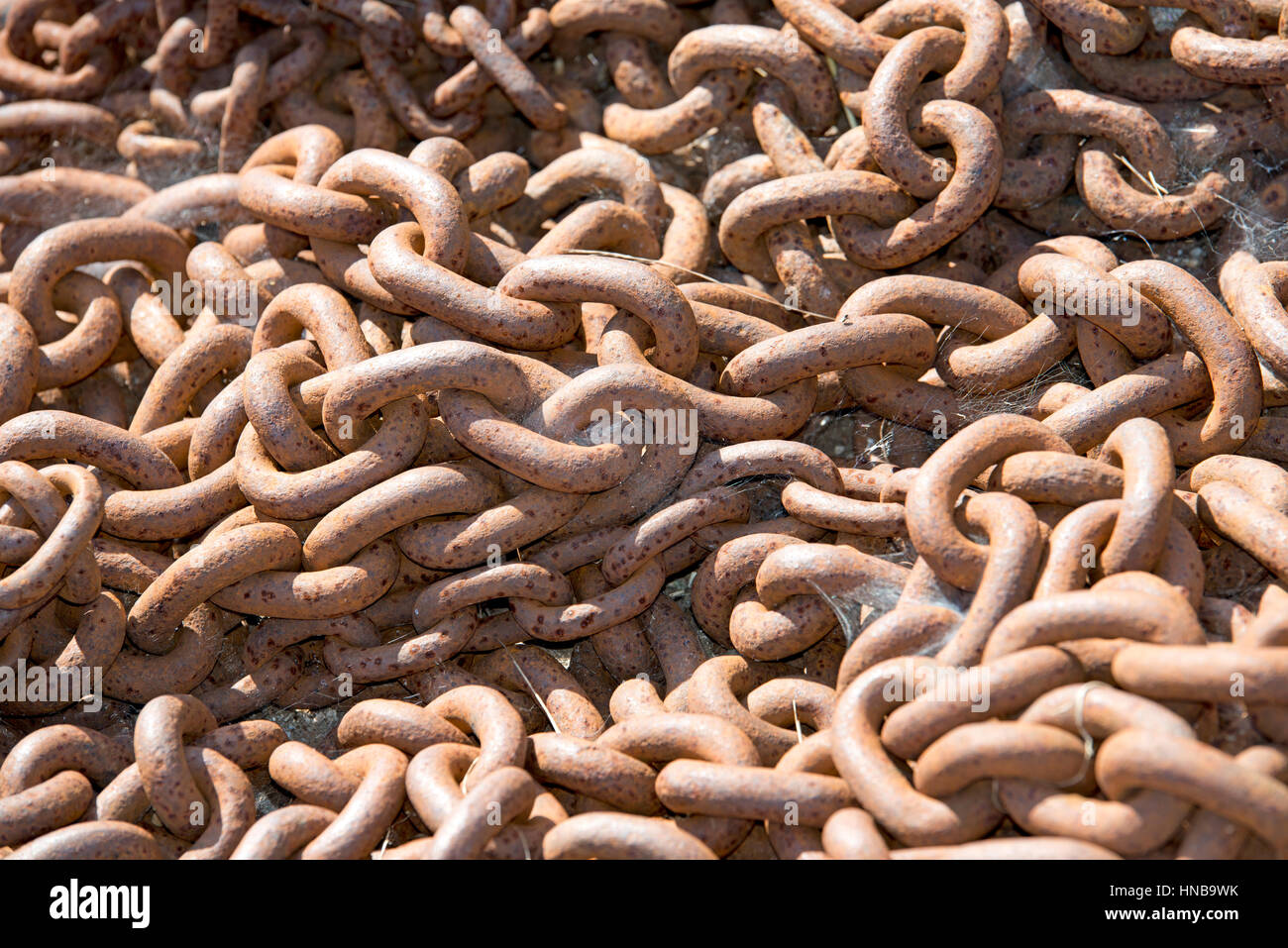 Rusty iron chain to make a connection Stock Photo - Alamy