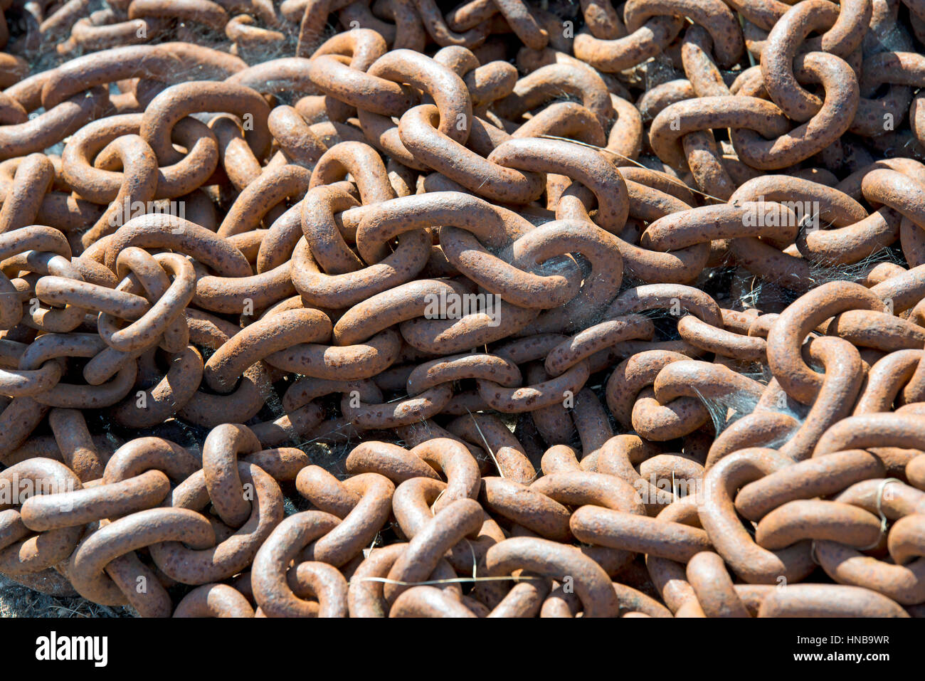 Rusty iron chain to make a connection Stock Photo - Alamy