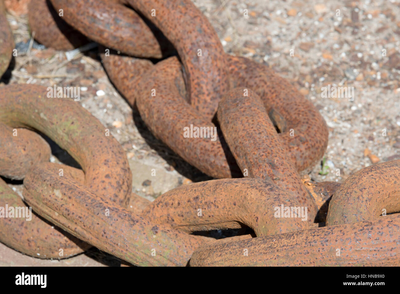 Rusty iron chain to make a connection Stock Photo - Alamy