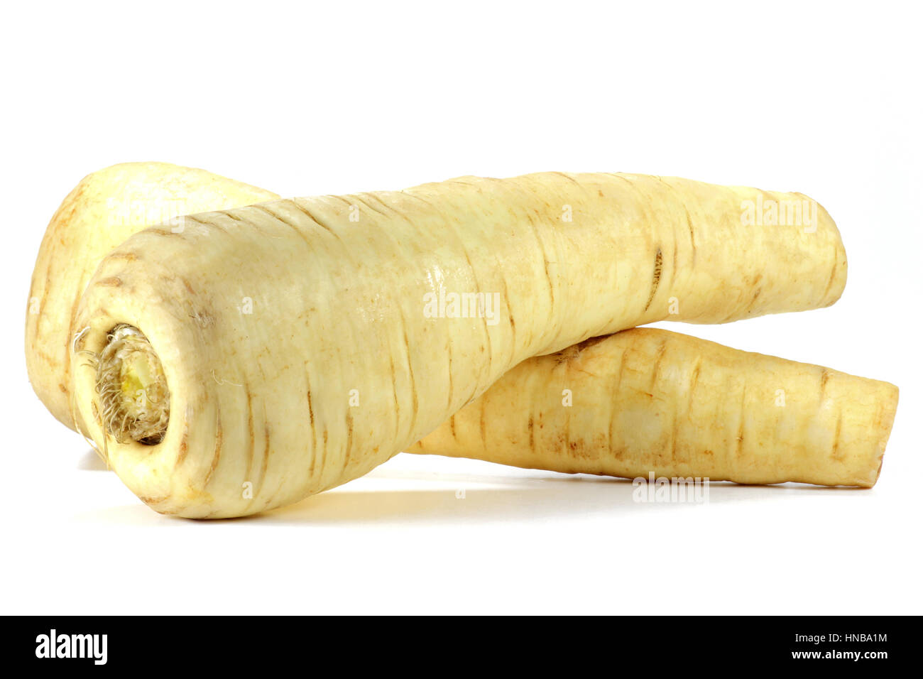 parsnips isolated on white background Stock Photo - Alamy