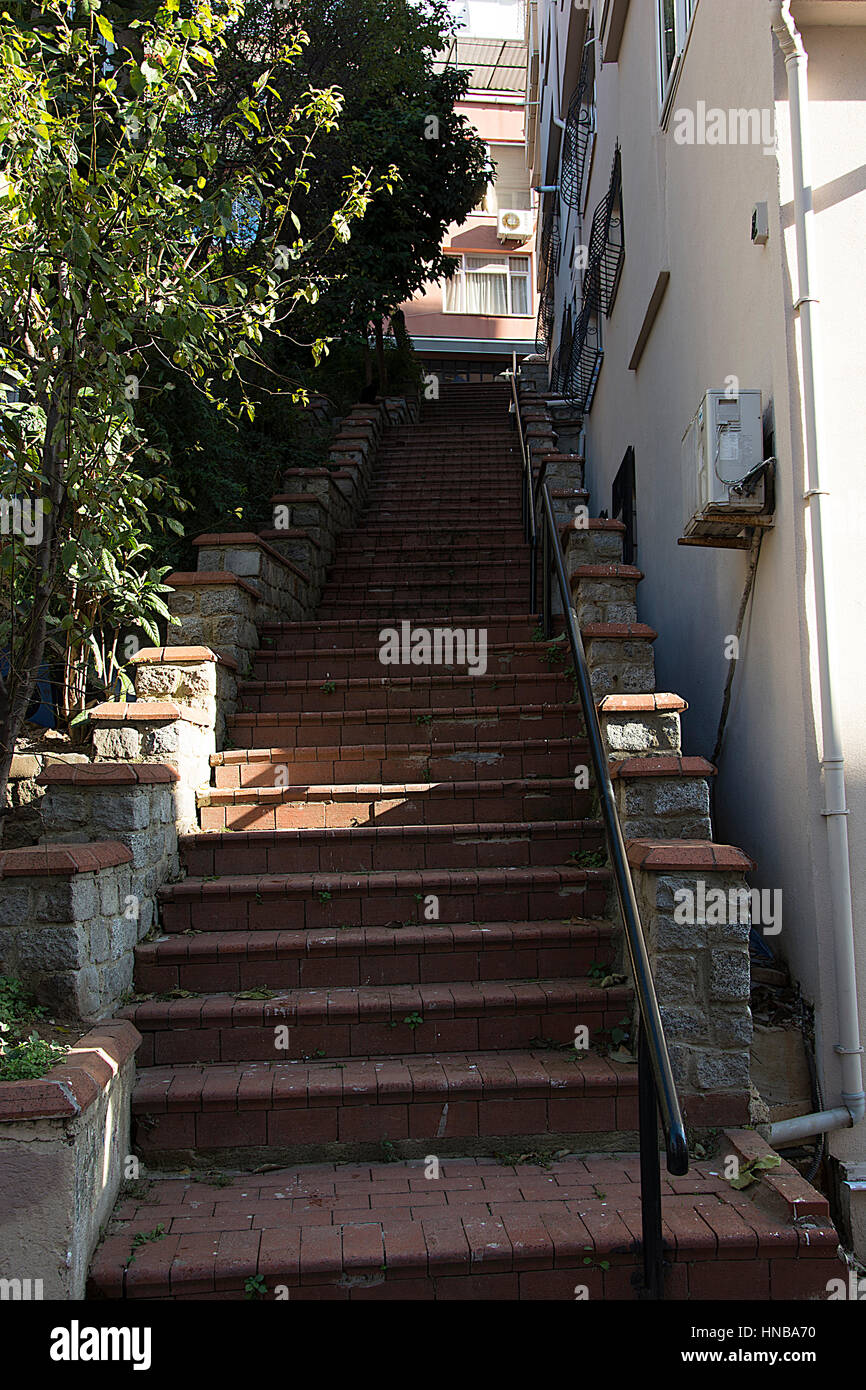 Stairs between streets Stock Photo - Alamy