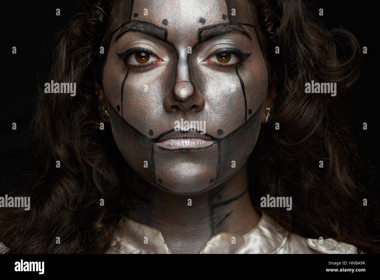 close up of women robot painted face isolated on black background Stock ...