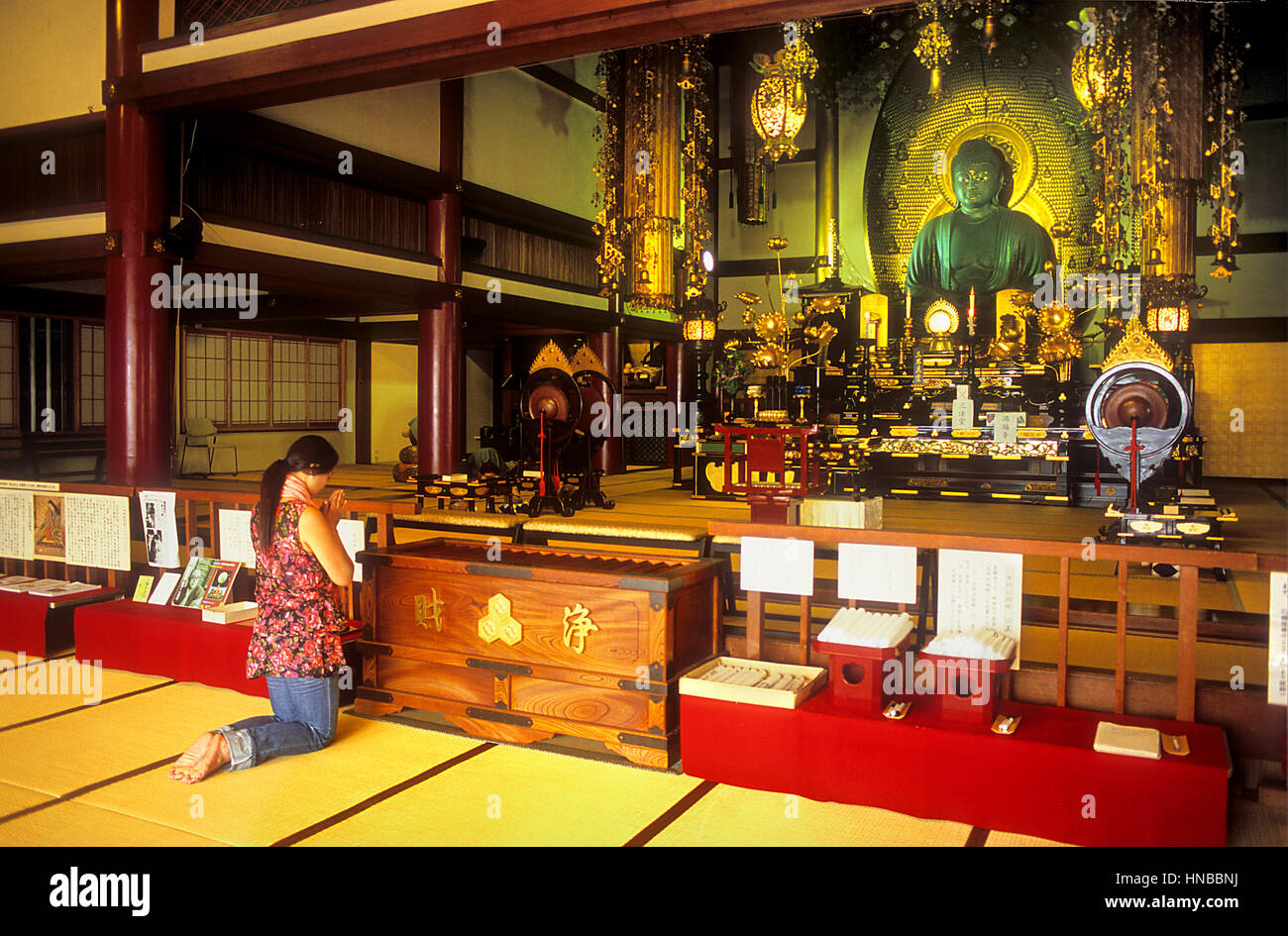 Praying at the Seiganji temple,Kyoto, Japan Stock Photo - Alamy