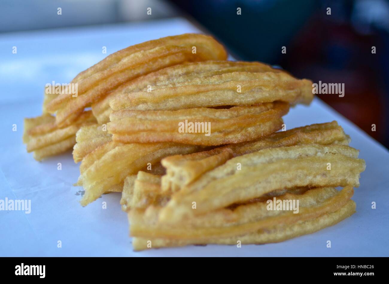 Preparing traditional Spanish churros, a fried-dough pastry Stock Photo ...