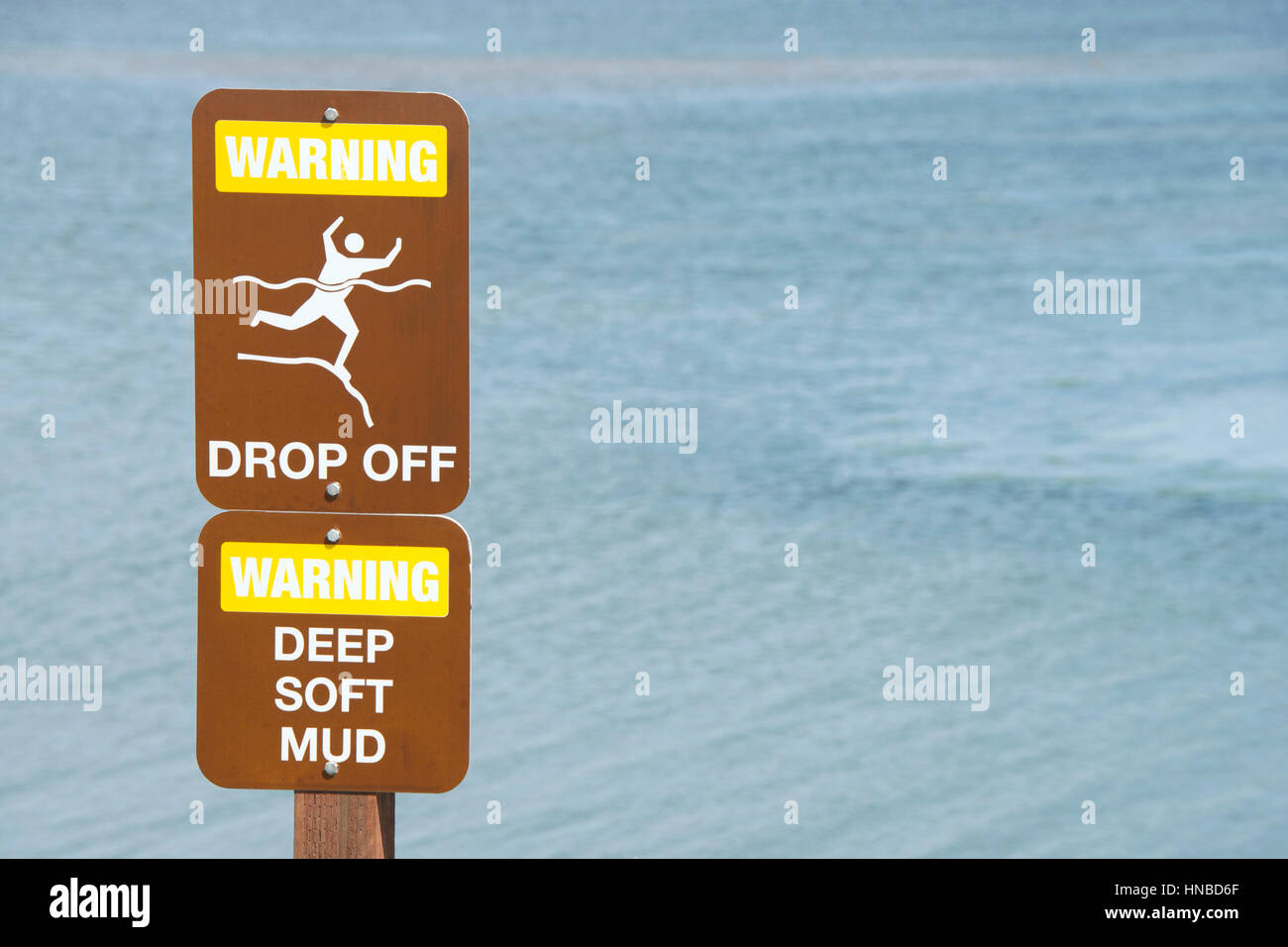 Warning Sign for drop off, deep soft mud potential for drowning Stock ...