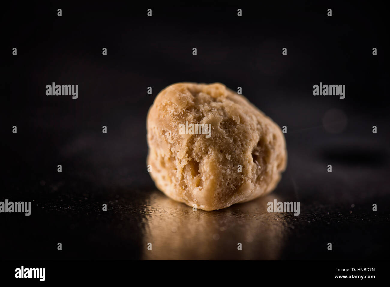 Single piece of marijuana extraction concentrate aka wax crumble on ...