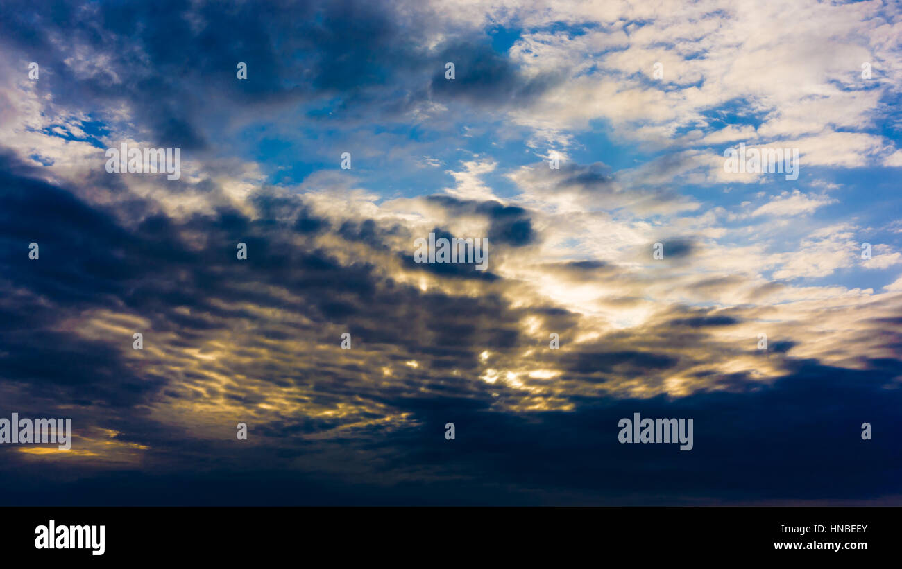 Beautiful cloudy sky with sun rays. Dramatic sky with stormy clouds ...