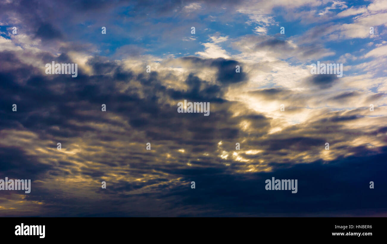 Beautiful cloudy sky with sun rays. Dramatic sky with stormy clouds ...