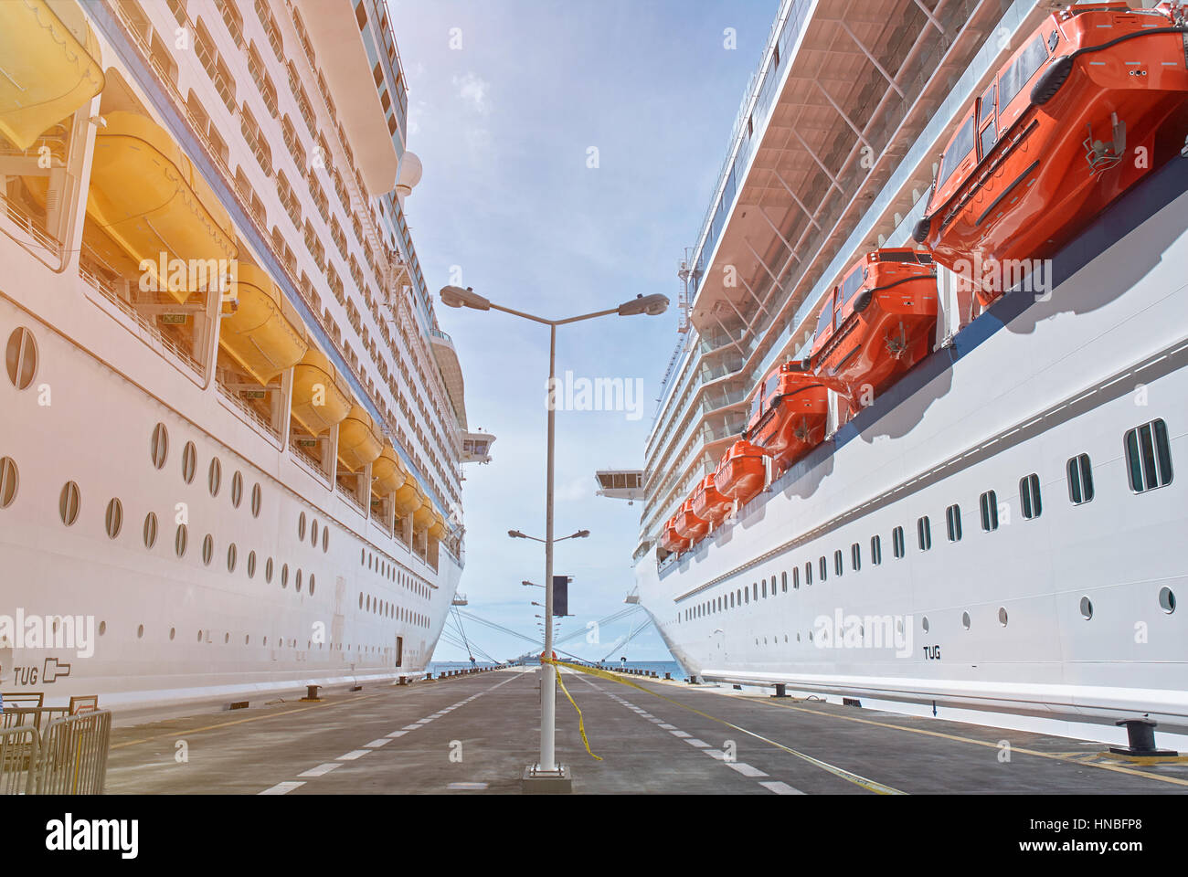 two cruise ships docked on pier on sunny days Stock Photo - Alamy