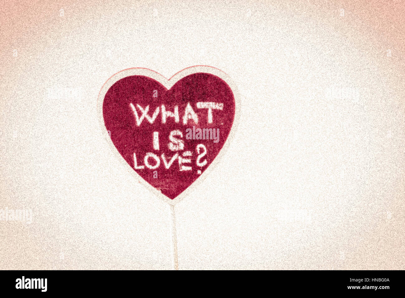 heart shape with text - what is love? Love concept sign Stock Photo - Alamy
