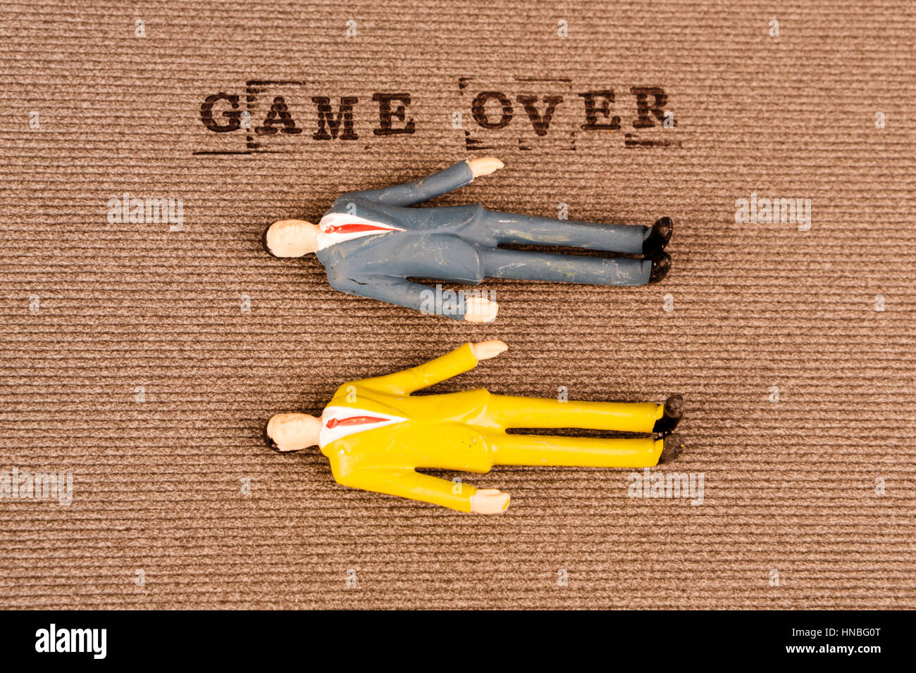 text game over with human bodies of mans and womans - death concept ...