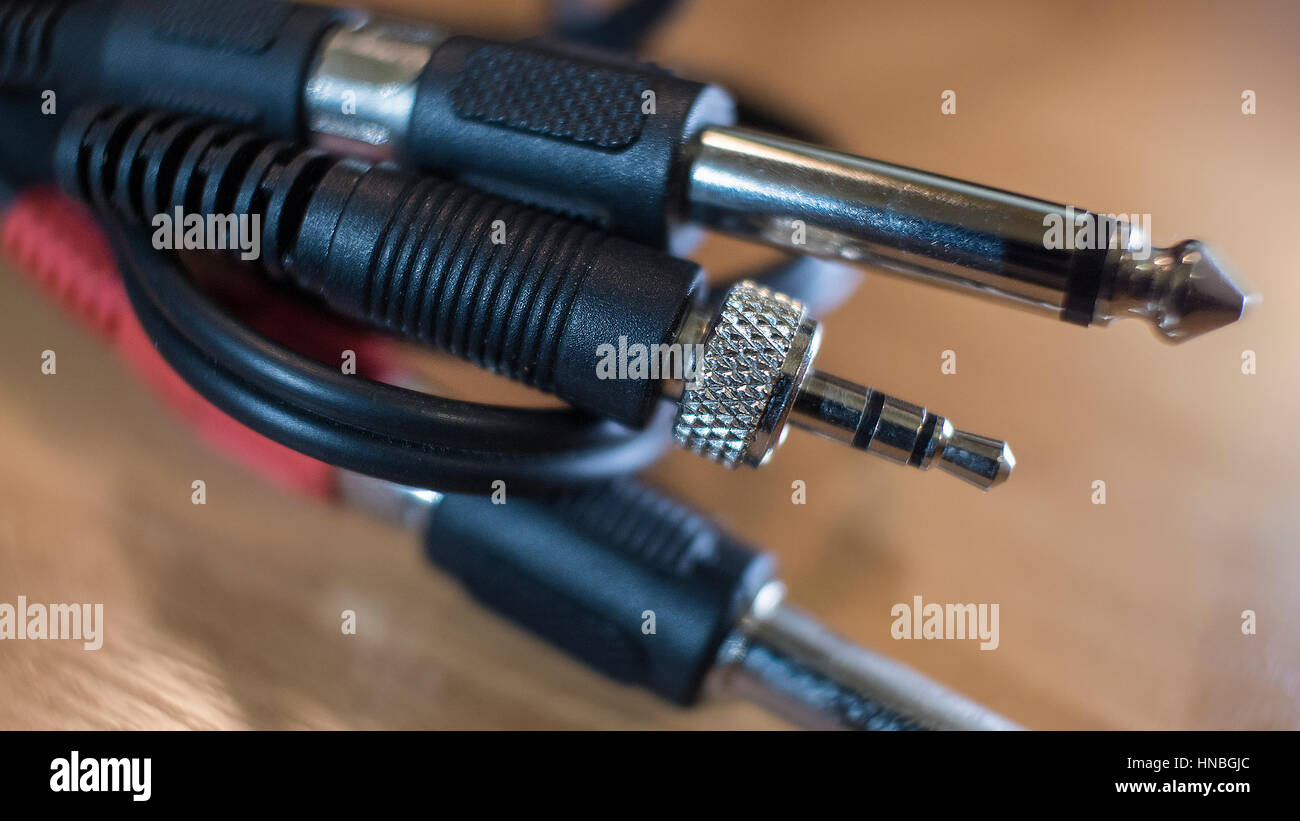 The audio stereo connectors with black wires Stock Photo - Alamy