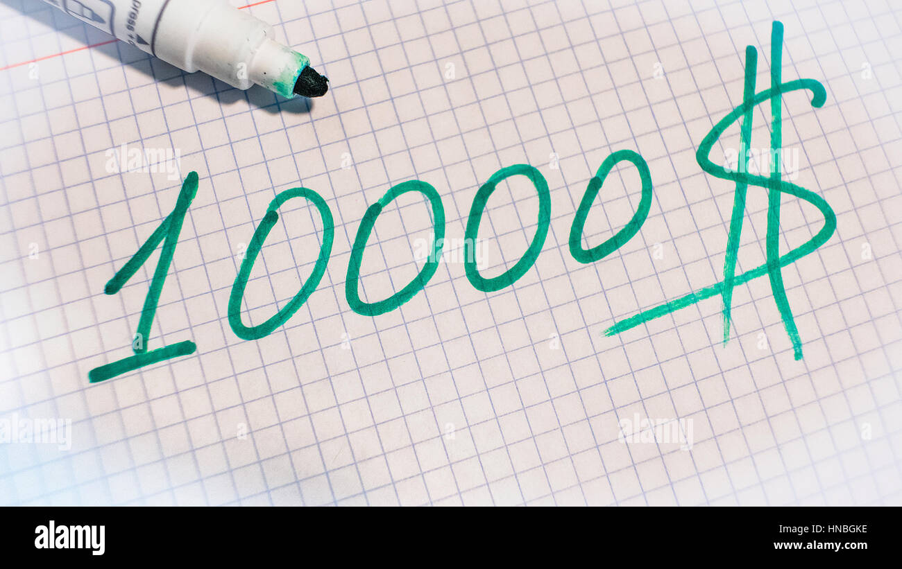 Inscription 10000 dollars on a piece of paper and a marker Stock Photo ...
