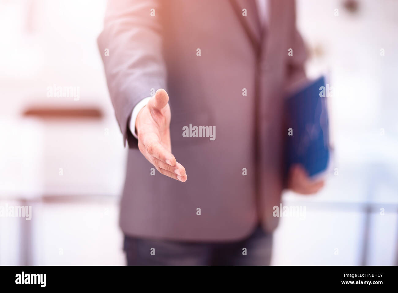 Business and office concept - businessman with open hand ready for ...