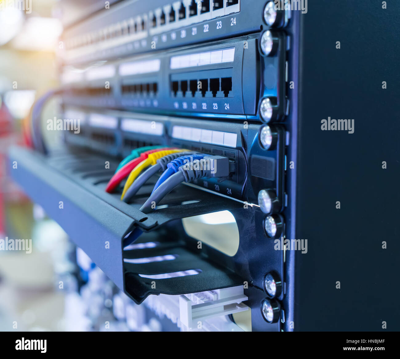 network cables and hub closeup with fiber optical background Stock ...