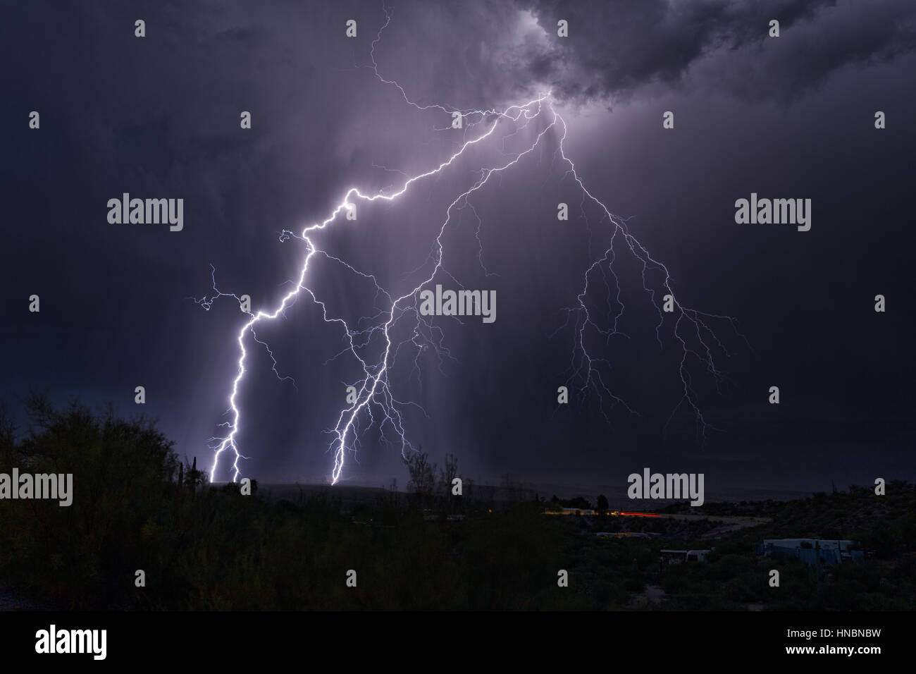 Powerful lightning bolt in a thunderstorm near Mammoth, Arizona Stock ...