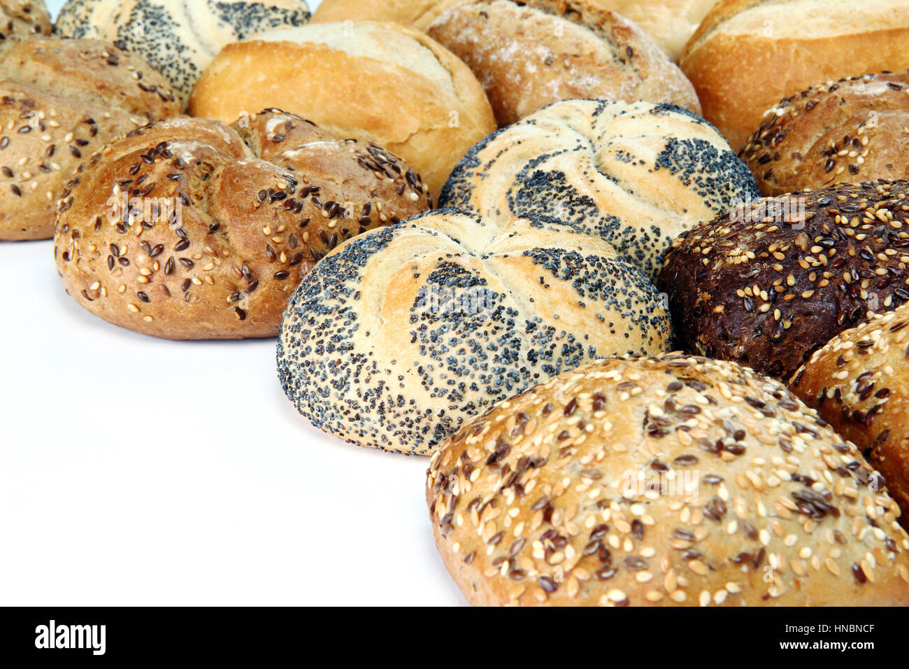 different kinds of buns on a white background Stock Photo - Alamy