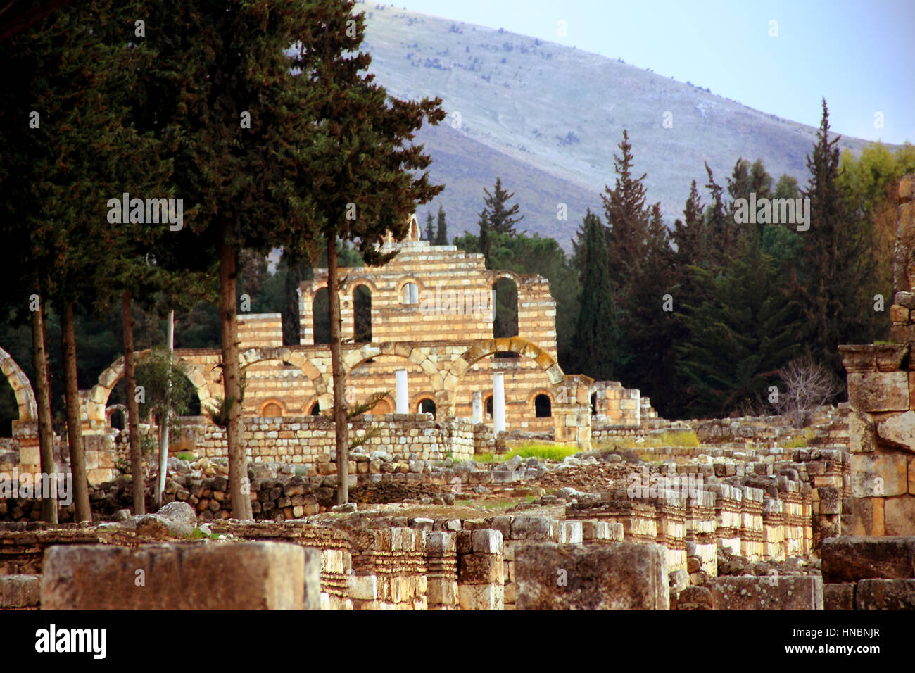 The numerous archways of the Omayyad Palace in Anjar, Lebanon rise ...