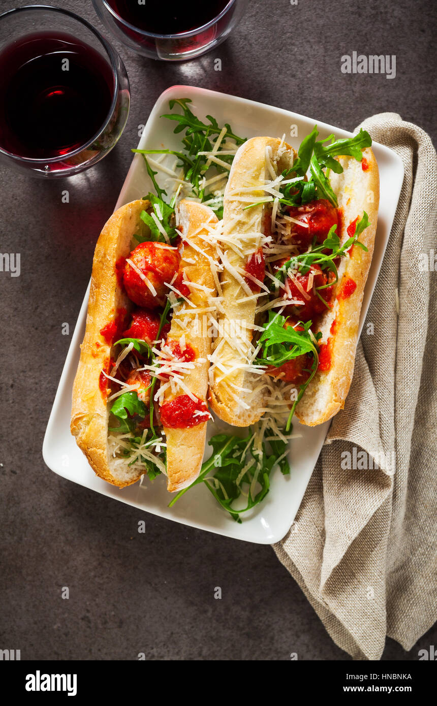 Hot Sandwich With Meatballs From Ricotta Cheese And Tomato Sauce In